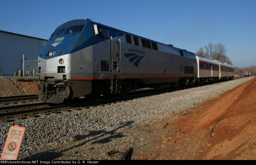 AMTK 95 on train "011" at Carroll Ave.
